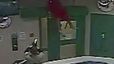 Prisoner falls through ceiling while trying to escape - BBC News