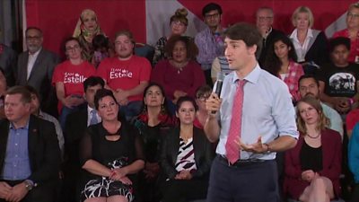 Moment Justin Trudeau hit by gravel - BBC News