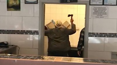 Video released of Wolverhampton takeaway axe attack - BBC News