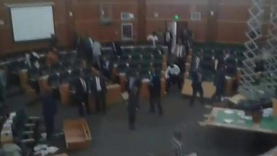 Lesotho MPs brawl in parliament - BBC News