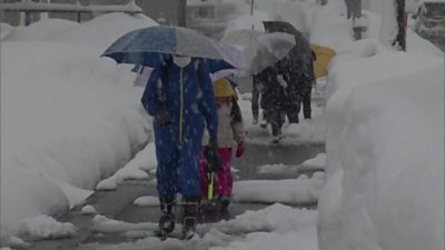 Japan snowstorm: 'I had to eat snow' - BBC News