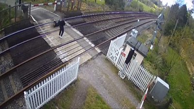 Network Rail releases CCTV footage of people playing on train tracks ...
