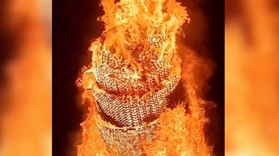 Northern Ireland: Moment giant bonfire collapses - BBC News
