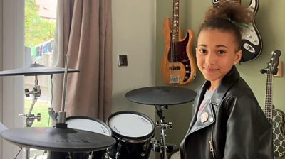 Quick Q&A with drumming star Nandi Bushell - BBC News