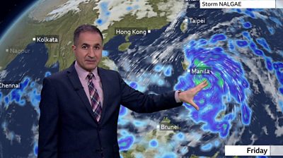 The Philippines battered by storm Nalgae floods and landslides - BBC News