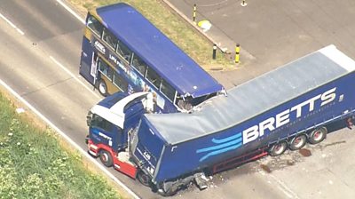 Pictures show aftermath of fatal A47 bus crash - BBC News