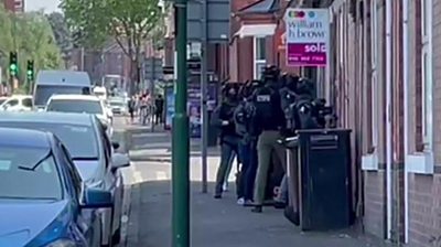 Nottingham attacks: Footage shows armed police raid in city - BBC News