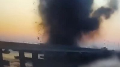 Ukraine war: Moment missile strikes bridge to Crimea - BBC News