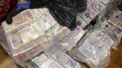 Watch moment police dog sniffs out €1m hidden cash - BBC News