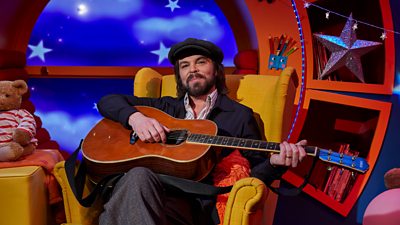 Hollywood star Jason Momoa dons black silk striped pyjamas and a ...