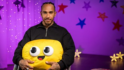 Sir Lewis Hamilton encourages children to dream big as he reads an ...