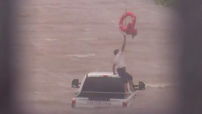 Watch fire engine rescue man from Hurricane Beryl floods in Texas - BBC ...