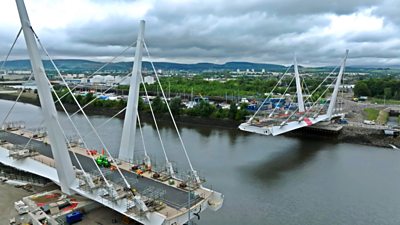 Watch: New Clyde road bridge links up for first time - BBC News