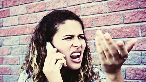 The reason people shout into their mobile phones