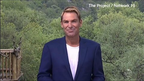 Shane Warne tells charity critics to 'get stuffed' - BBC News