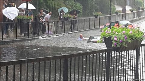 Flash flooding causes chaos in parts of England - BBC News