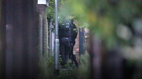 Oldham house siege ends after 25 hours - BBC News