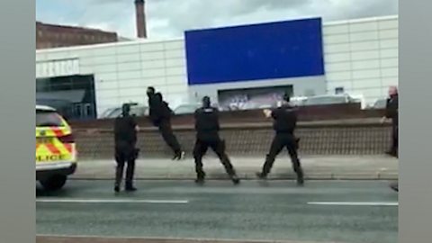 Manchester police Taser 'crossbow-carrying knifeman' - BBC News