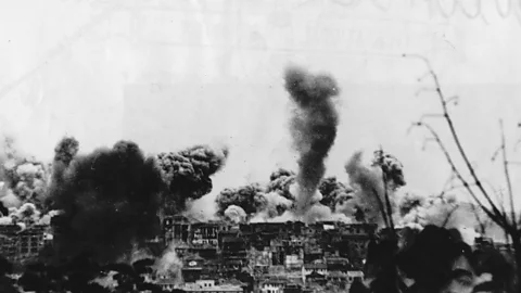 Getty Images Xia Peisu’s home of Chongqing, China during a Japanese airstrike in 1940 (Credit: Getty Images)