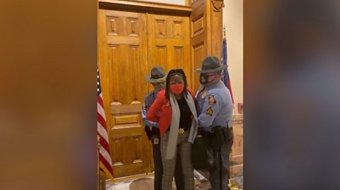 Georgia lawmaker arrested as governor signs new election law - BBC News