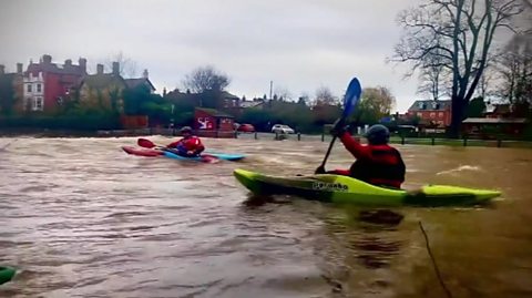 More flood barriers erected along Severn amid high river levels - BBC News