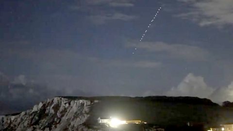 Elon Musk's Starlink satellites light up sky in south of England - BBC News