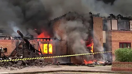 Holiday Inn destroyed by fire 'too dangerous to enter' - BBC News