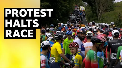 Five arrested as protest halts elite UCI cycling race - BBC News