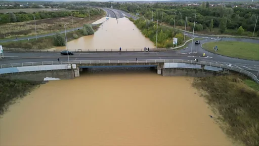 Severely flooded A421 Bedfordshire road fully reopens - BBC News