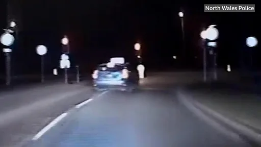 Conwy: Man jailed after 100mph police car chase on 20mph road - BBC News