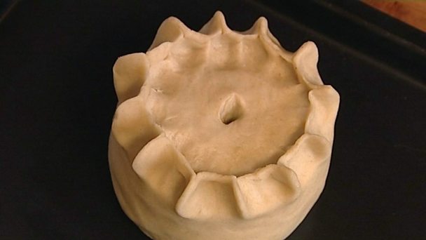 How to shape hot water pastry for a raised pie - BBC Food