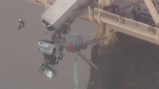 Kentucky: Woman rescued from truck dangling off bridge in Louisville ...
