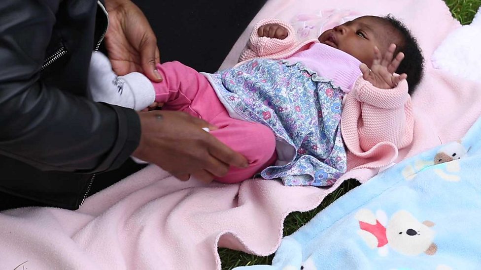 Baby aerobics: Pedalling legs and stretching arms - BBC Tiny Happy People