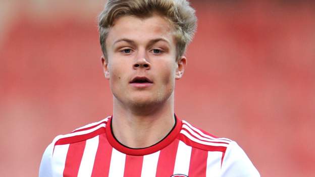 Jaakko Oksanen: AFC Wimbledon sign Brentford midfielder on loan - BBC Sport