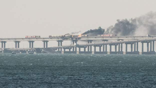 Ukraine war latest: Crimea bridge partly reopens after huge blast ...
