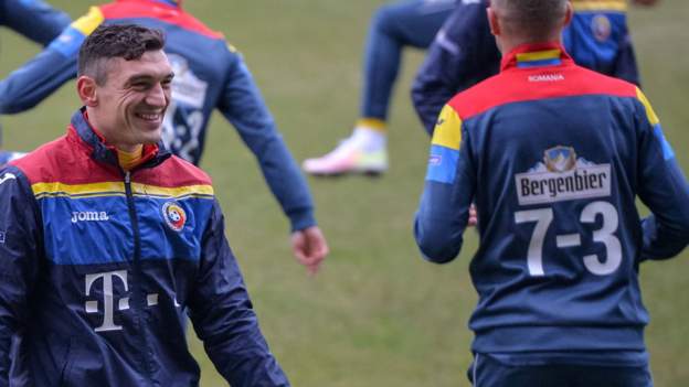 Romania players wear maths equations to help country's children - BBC Sport