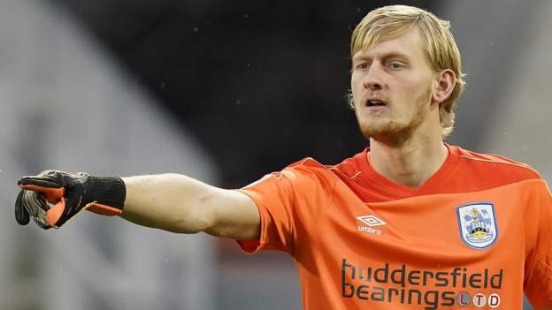 Ryan Schofield: Hibernain sign Huddersfield Town goalkeeper on loan ...
