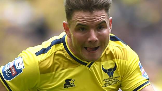 Alex MacDonald: Oxford winger back in training after stay in hospital ...