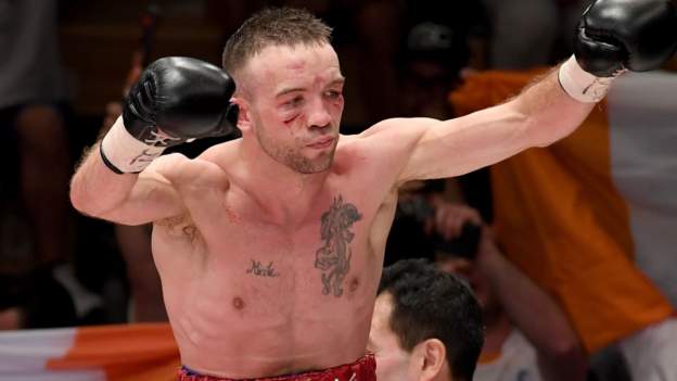 TJ Doheny: Irish boxer wins IBF world super bantamweight title - BBC Sport