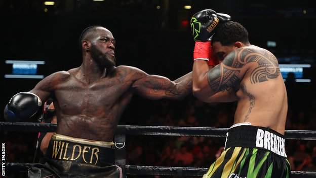 Deontay Wilder knocks out Dominic Breazeale in first round to defend title - BBC Sport
