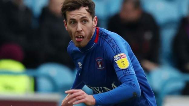 Jamie Devitt: Blackpool sign Carlisle United midfielder on free ...