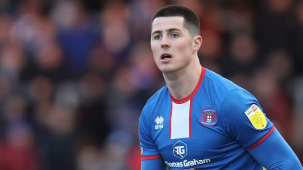 Jon Mellish: Carlisle United midfielder signs new deal until 2026 - BBC ...