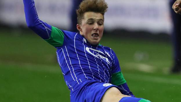 Tottenham sign Wigan youngster Alfie Devine - BBC Sport