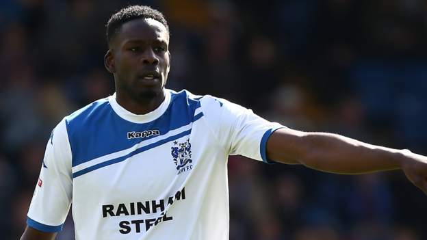 Leon Barnett: Northampton Town sign defender from Bury - BBC Sport