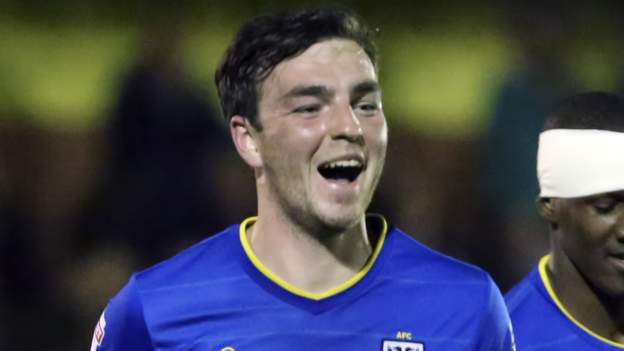 Ross County sign Sean Kelly after AFC Wimbledon exit for defender - BBC ...