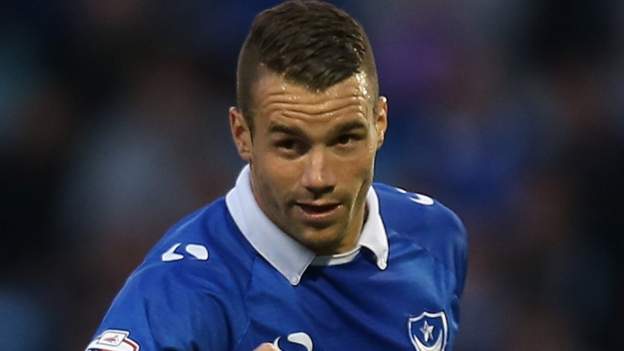 James Dunne: Portsmouth midfielder joins Cambridge United - BBC Sport