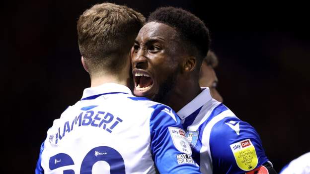 Chey Dunkley: Shrewsbury Town sign former Sheffield Wednesday centre ...