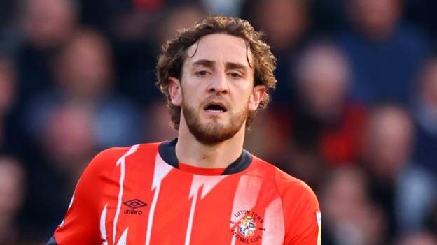 Tom Lockyer: Luton Town captain still in hospital after collapse in ...
