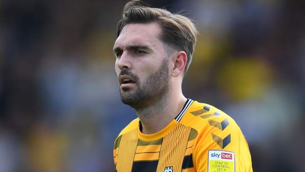 Greg Taylor: Cambridge defender delighted to be back after long injury ...
