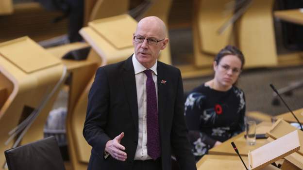 Cuts needed to ease budget strain - Swinney - BBC News